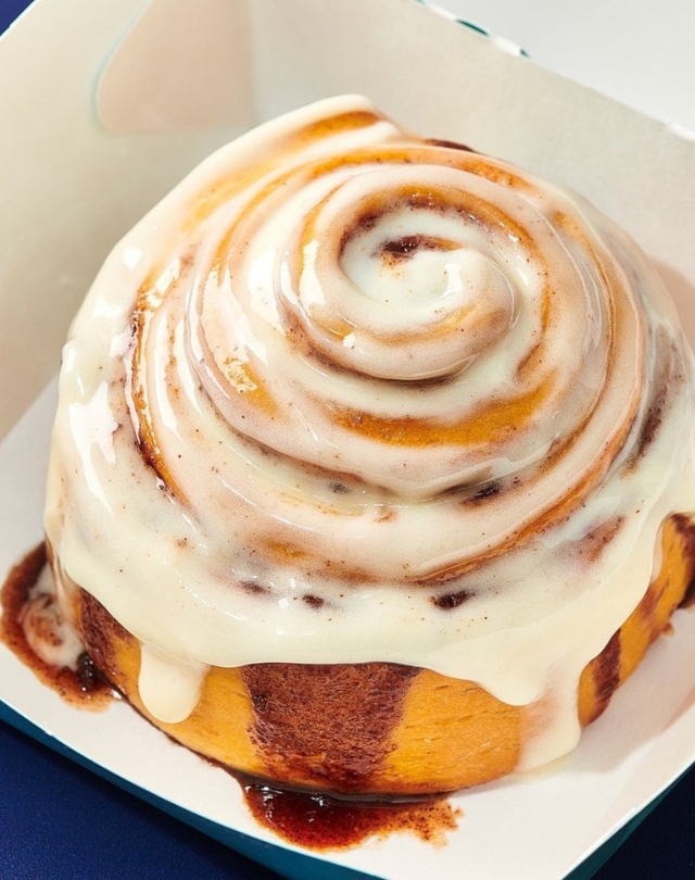 Man walking to a marooned boat